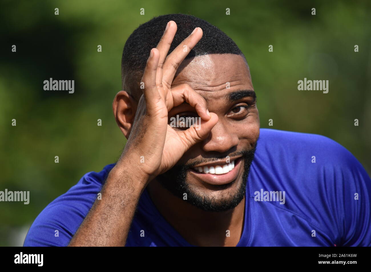 An Okay Male Athlete Stock Photo - Alamy