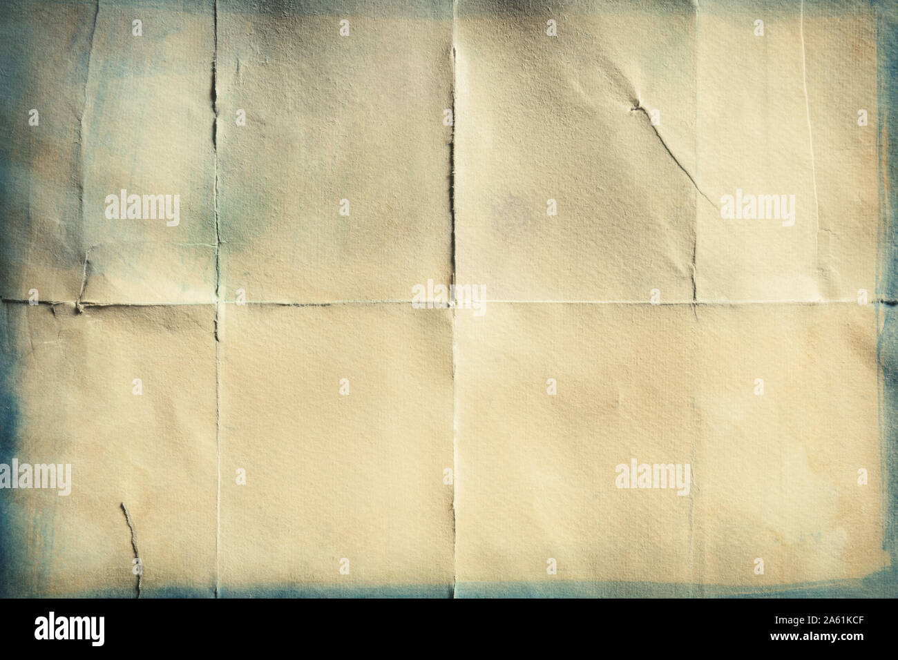 Close-up of old paper folded in eight texture background Stock Photo ...
