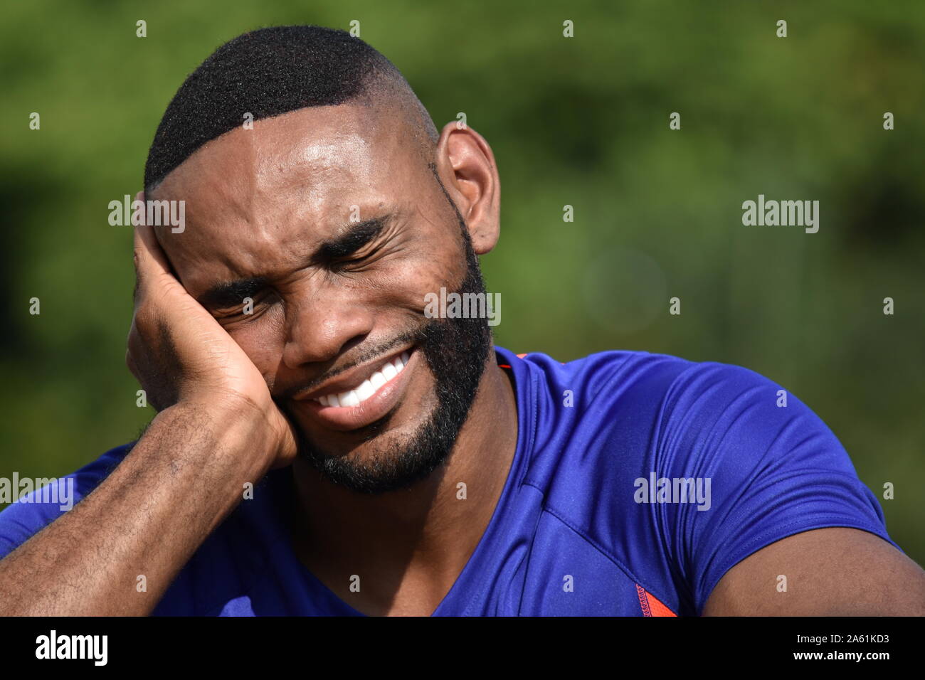 Tired Male Athlete Stock Photo - Alamy