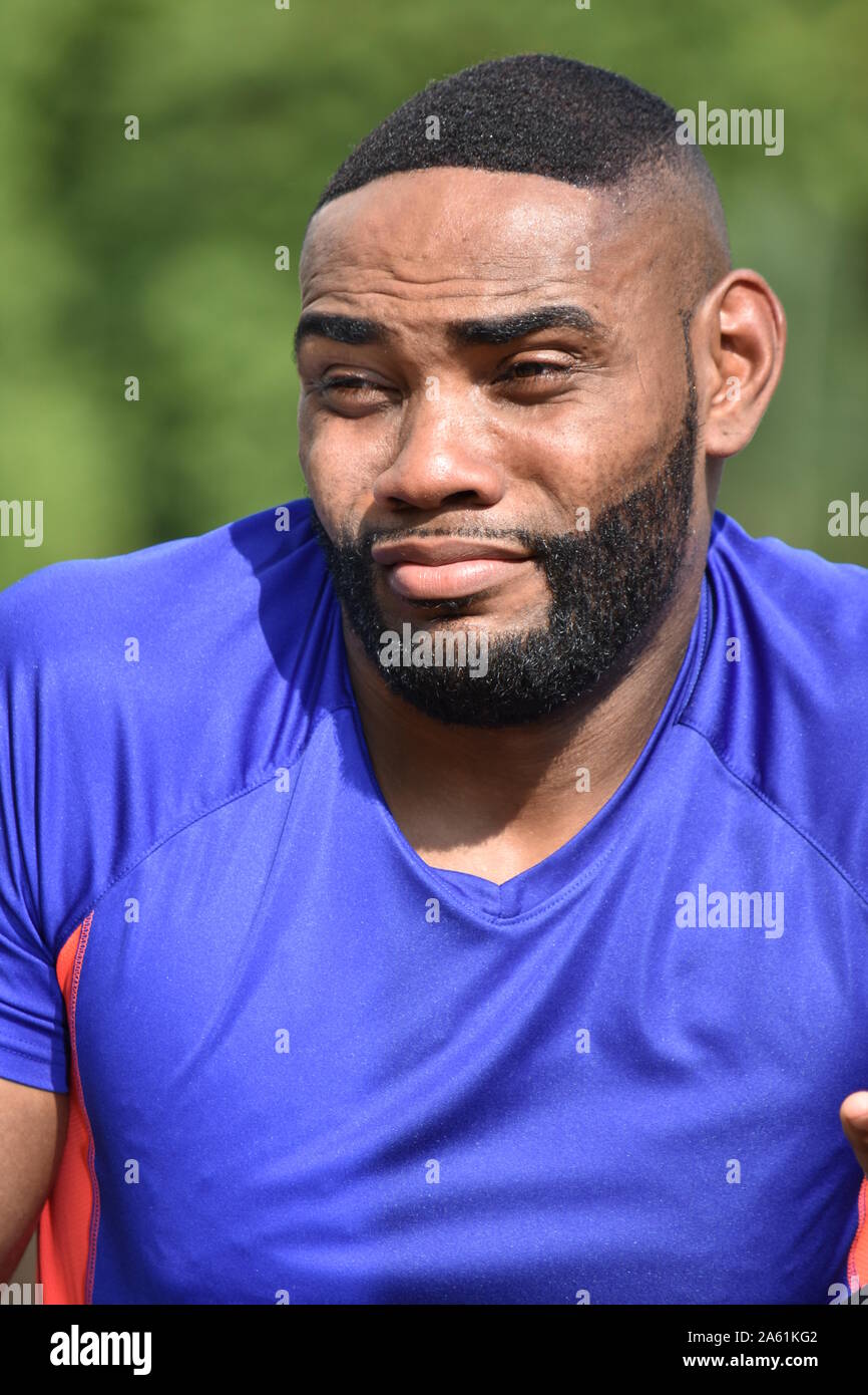 Confused African Male Athlete Stock Photo - Alamy