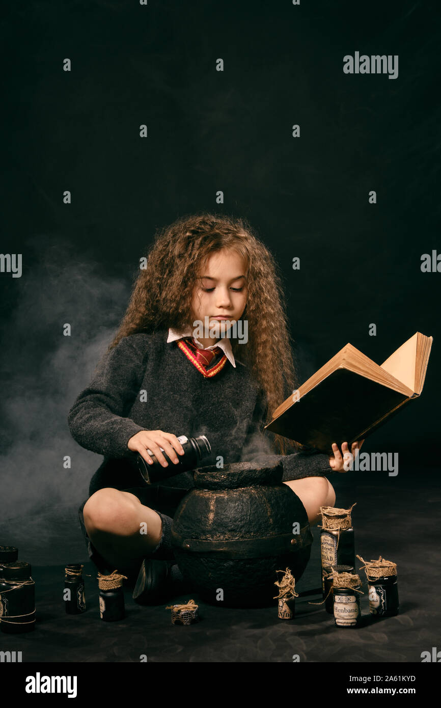 Portrait of a lovely little charmer with magnificent long brown hair ...