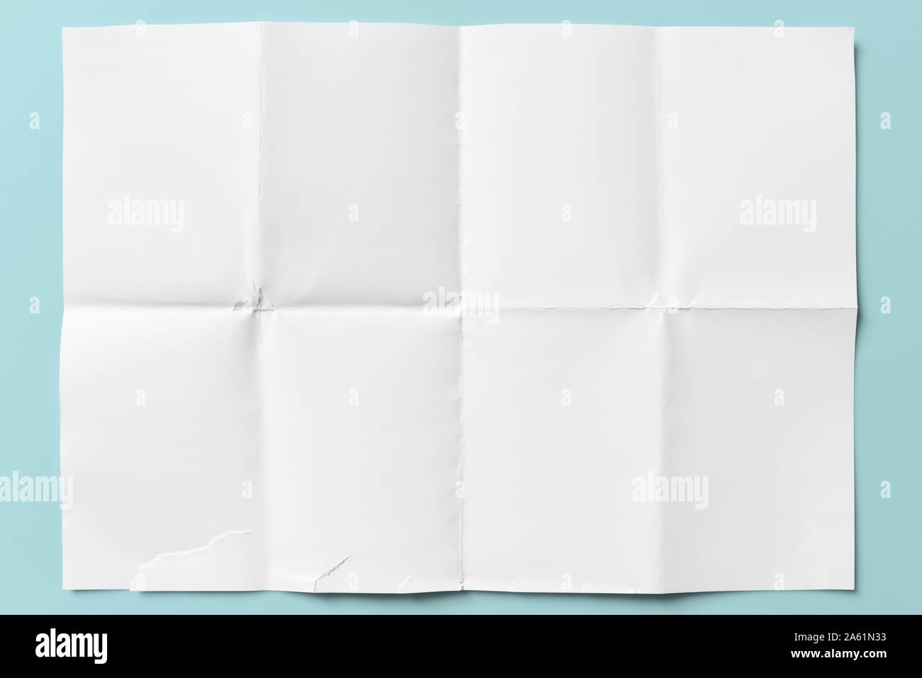 Close-up of empty paper folded in eight, texture background Stock Photo ...