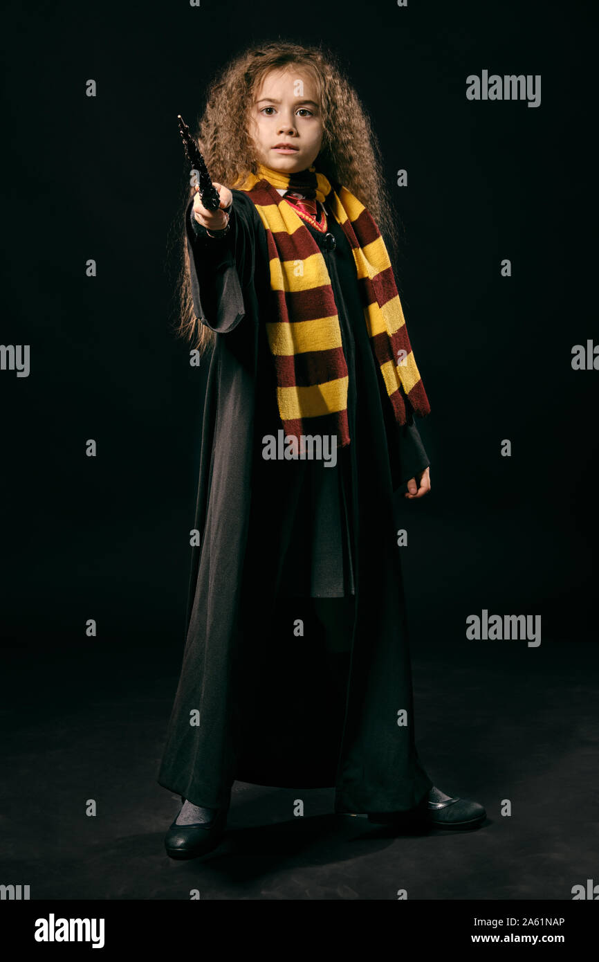 Portrait of a charming little charmer with magnificent long brown hair ...