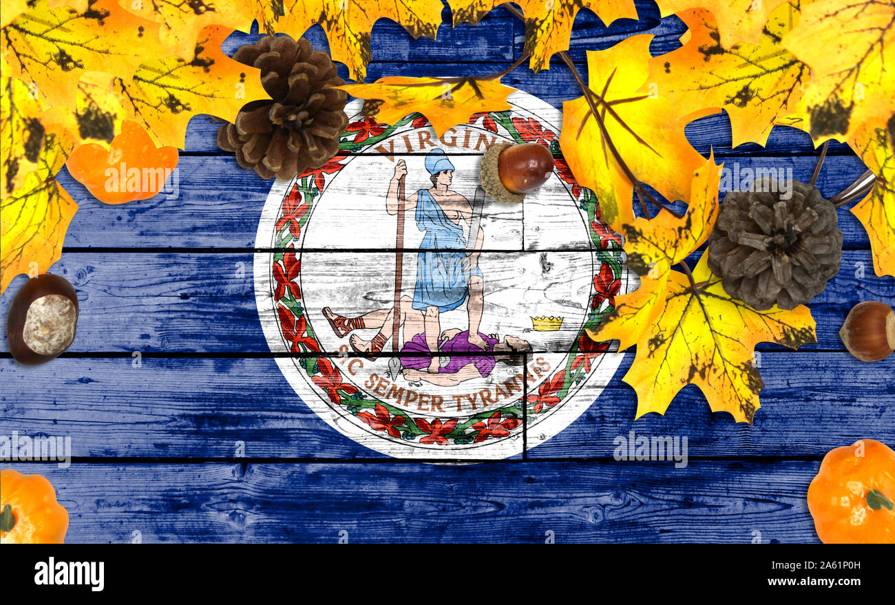 State of Virginia flag on autumn wooden background with leaves and good ...