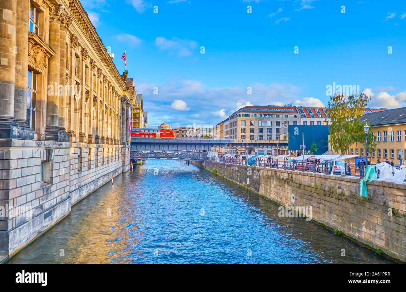 BERLIN, GERMANY - OCTOBER 3, 2019: The red train runs on the railway ...