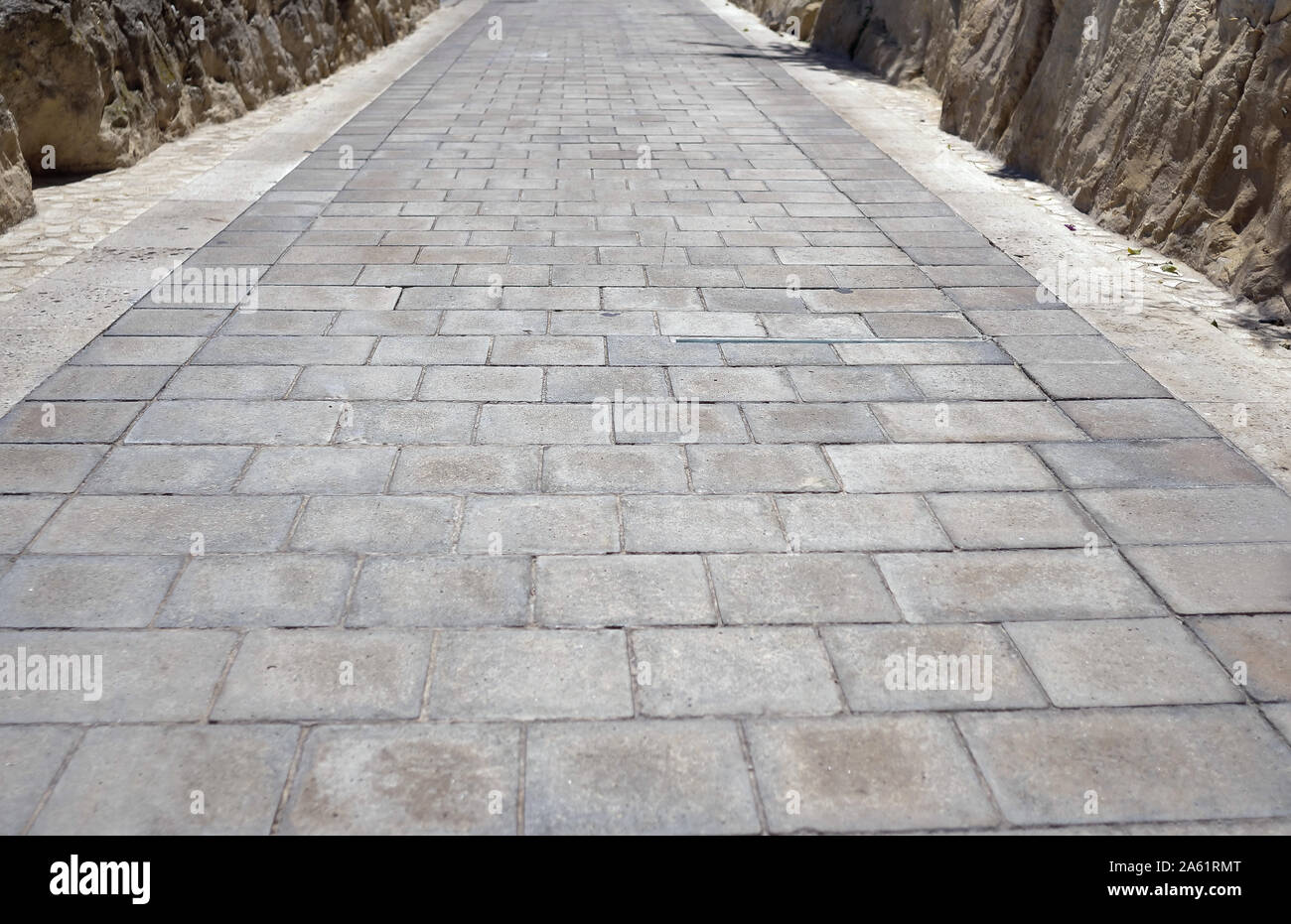 Old stone tile on footpath hi-res stock photography and images - Alamy