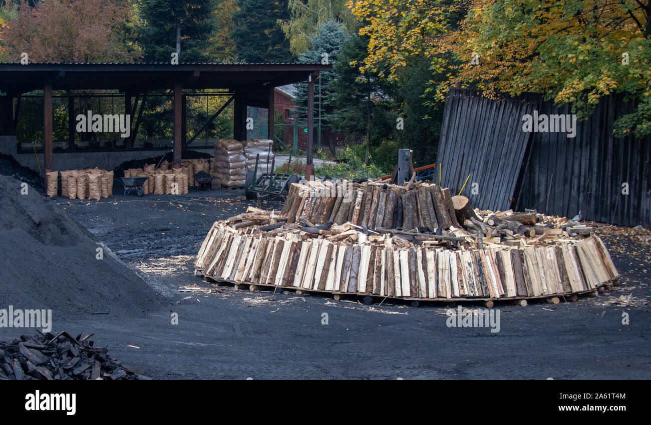 Charcoal pile prepared for churning Stock Photo - Alamy