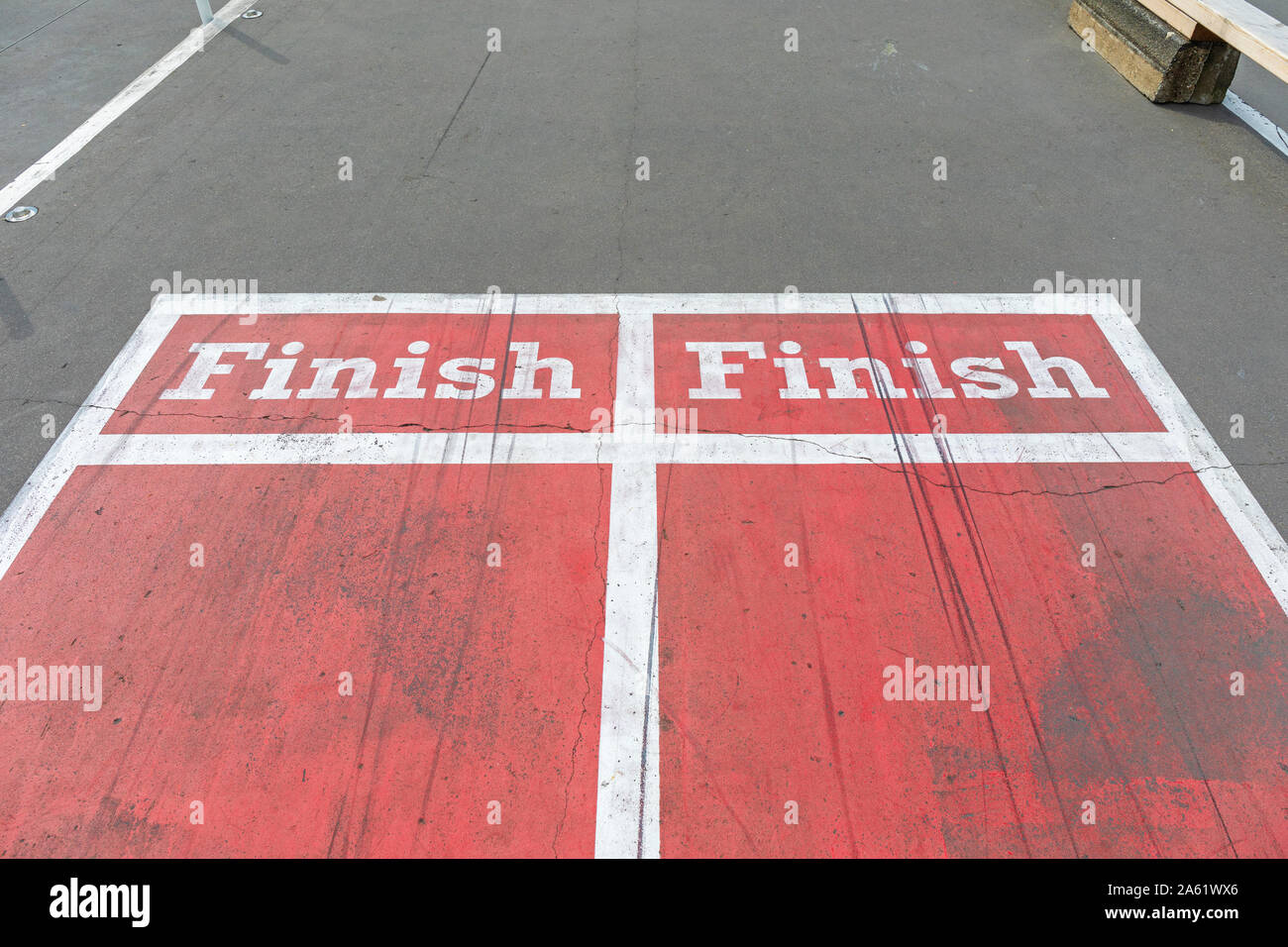 Dual Finish Line at Red Running Sports Track Stock Photo - Alamy