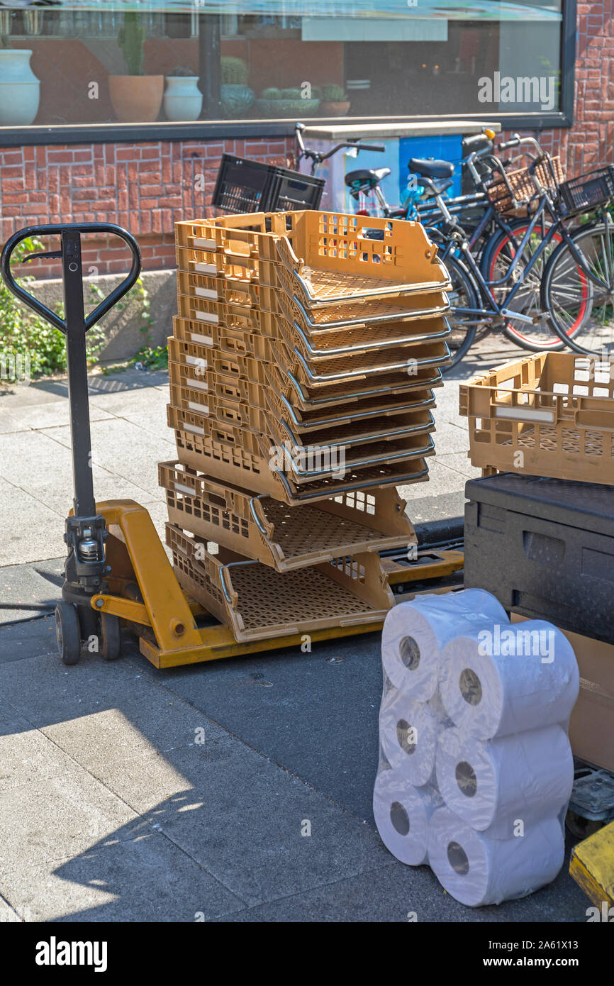 Plastic Crates at Pallet Jack Logistics Delivery Stock Photo - Alamy
