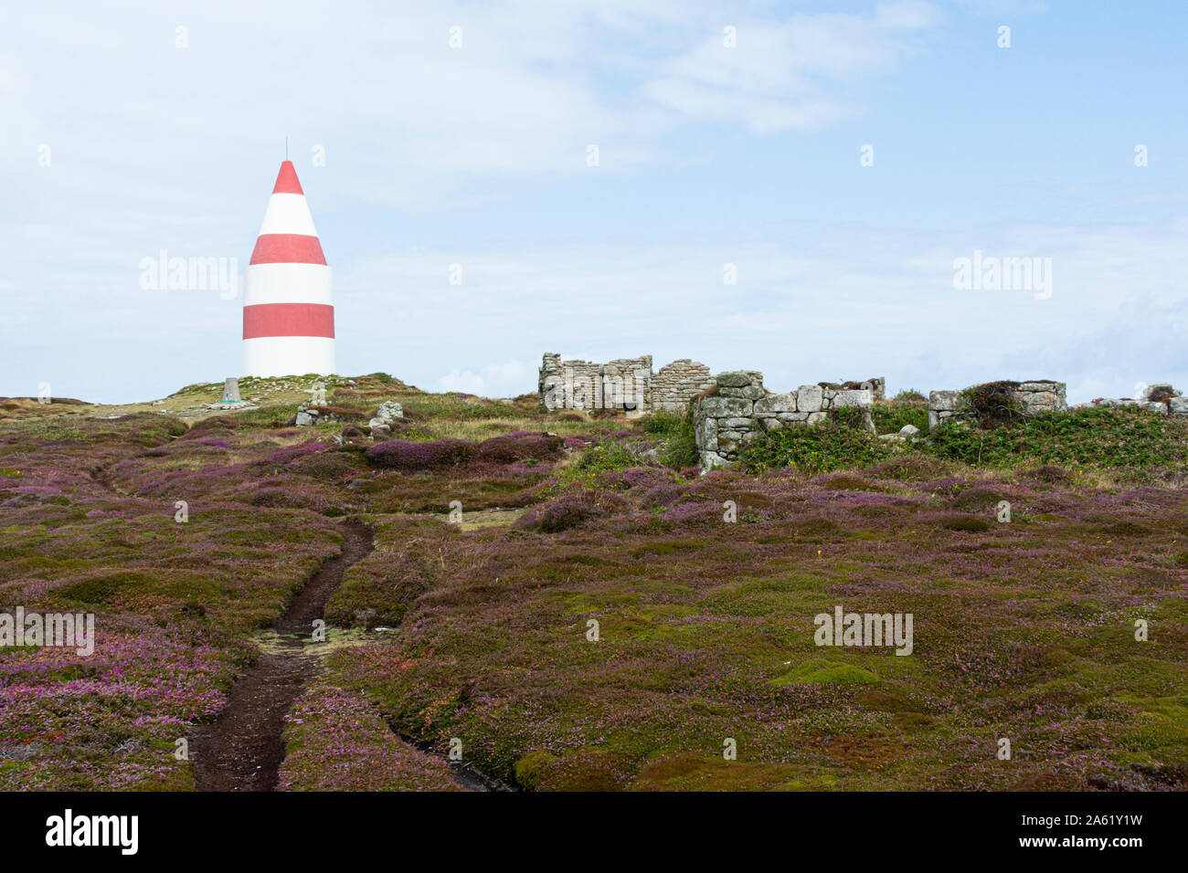 The red and white striped daymark and the remains of the Napoleonic era ...