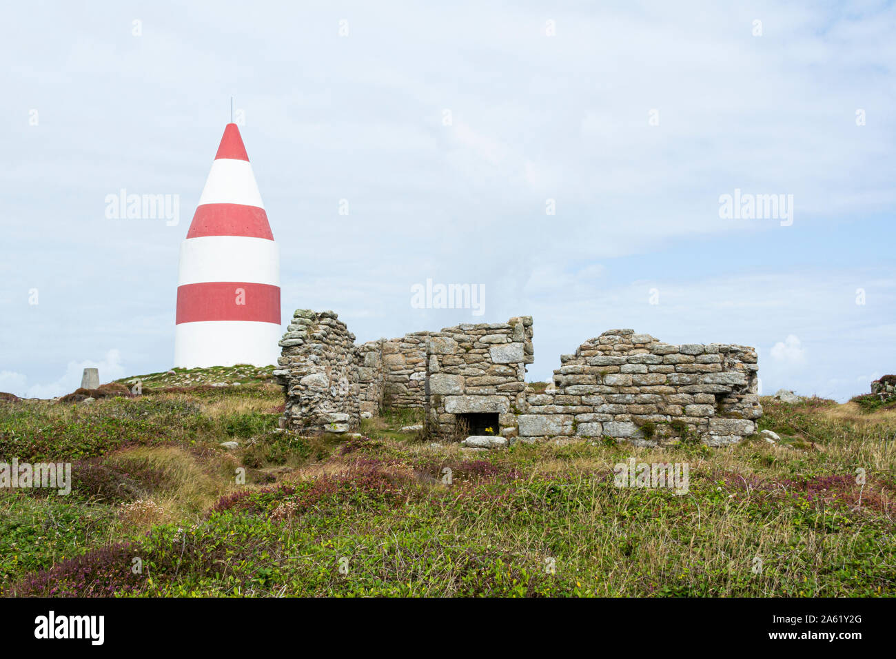 The red and white striped daymark and the remains of the Napoleonic era ...