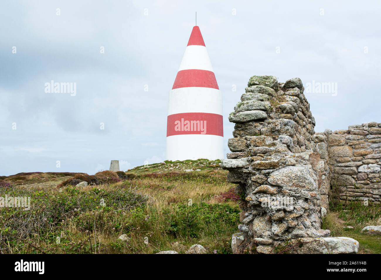 The red and white striped daymark and the remains of the Napoleonic era ...