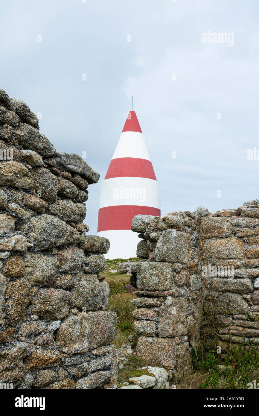 The red and white striped daymark and the remains of the Napoleonic era ...