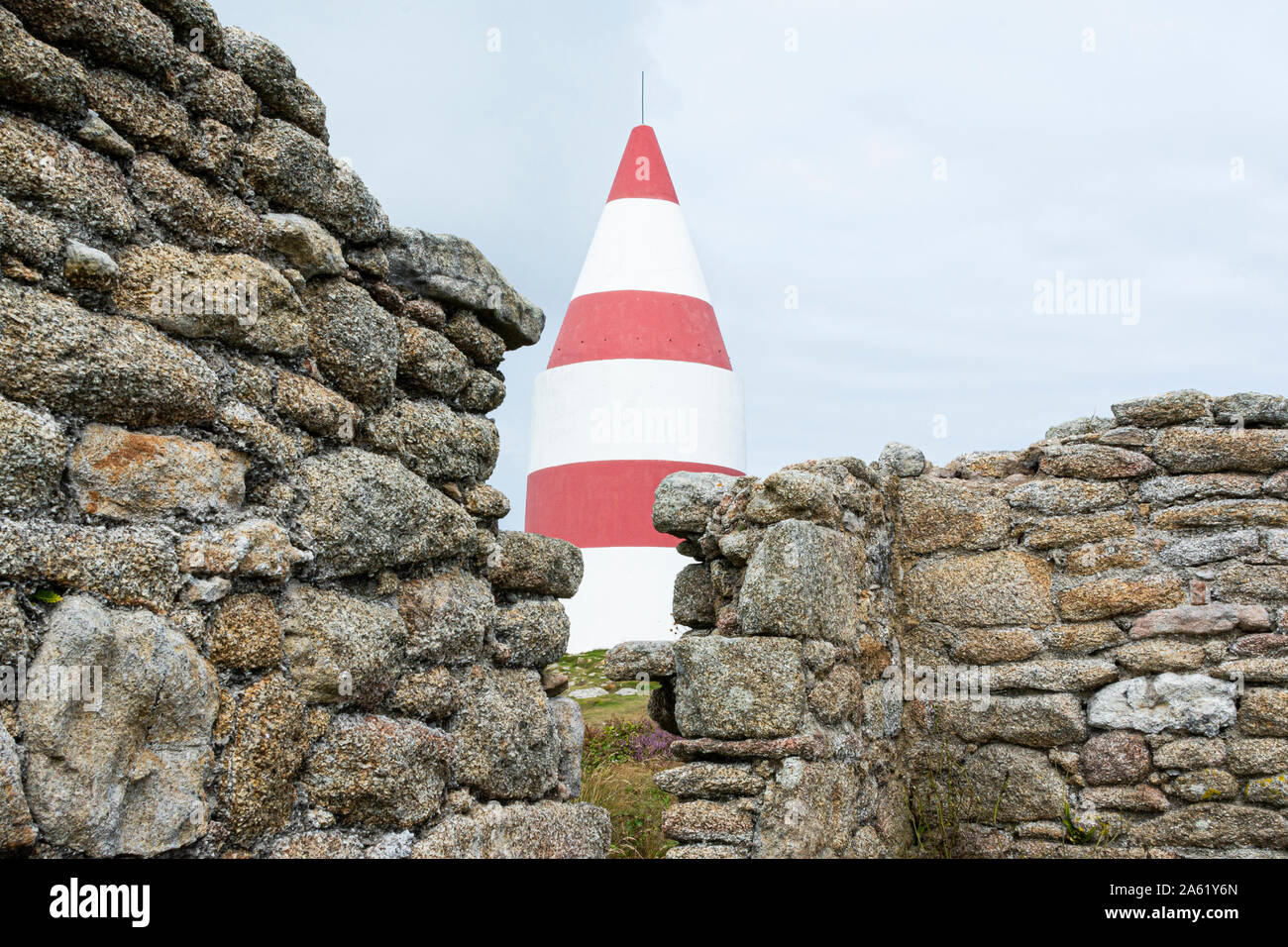 The red and white striped daymark and the remains of the Napoleonic era ...