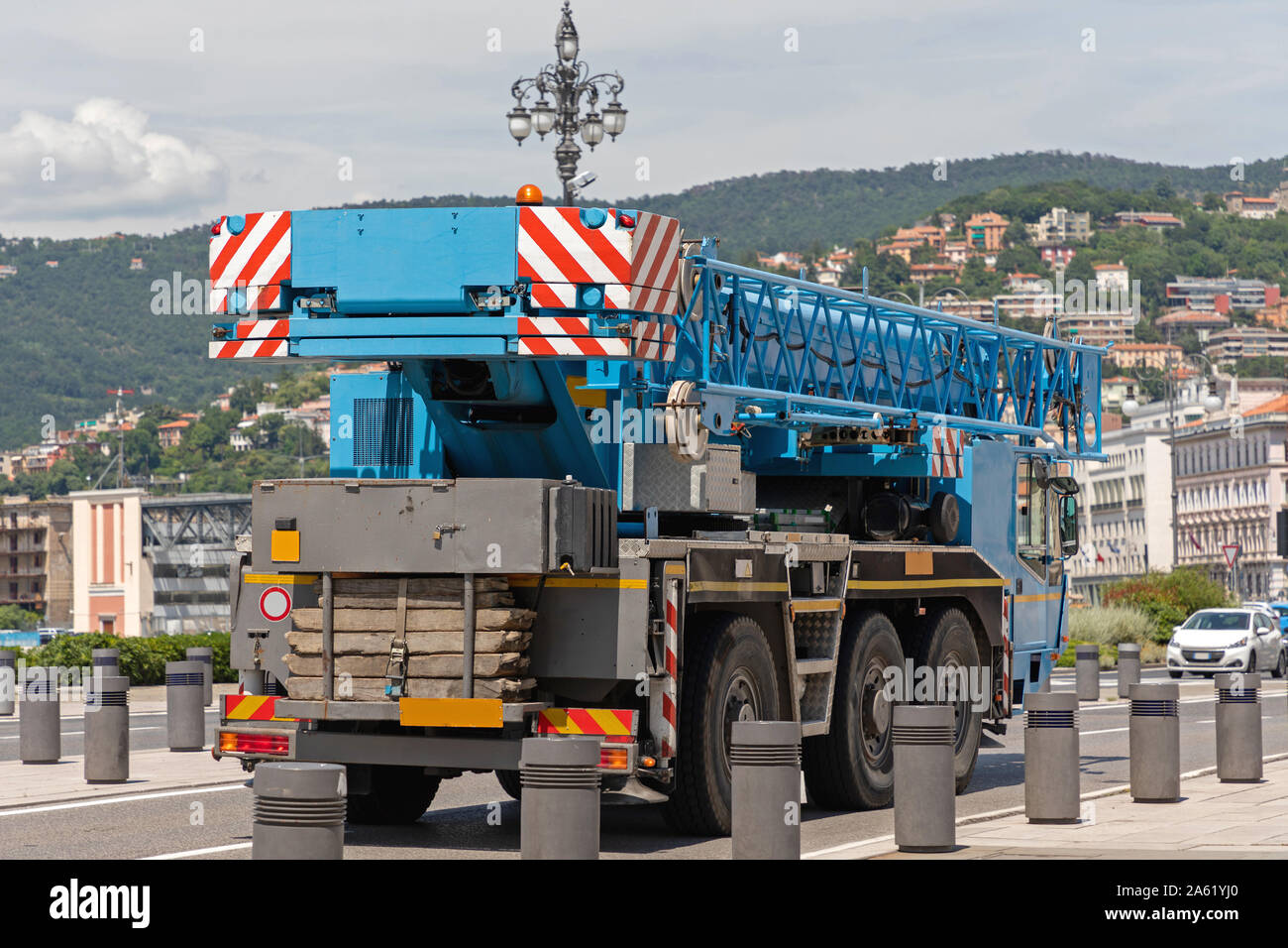 Portable Construction Crane Machine Blue Truck in City Stock Photo - Alamy