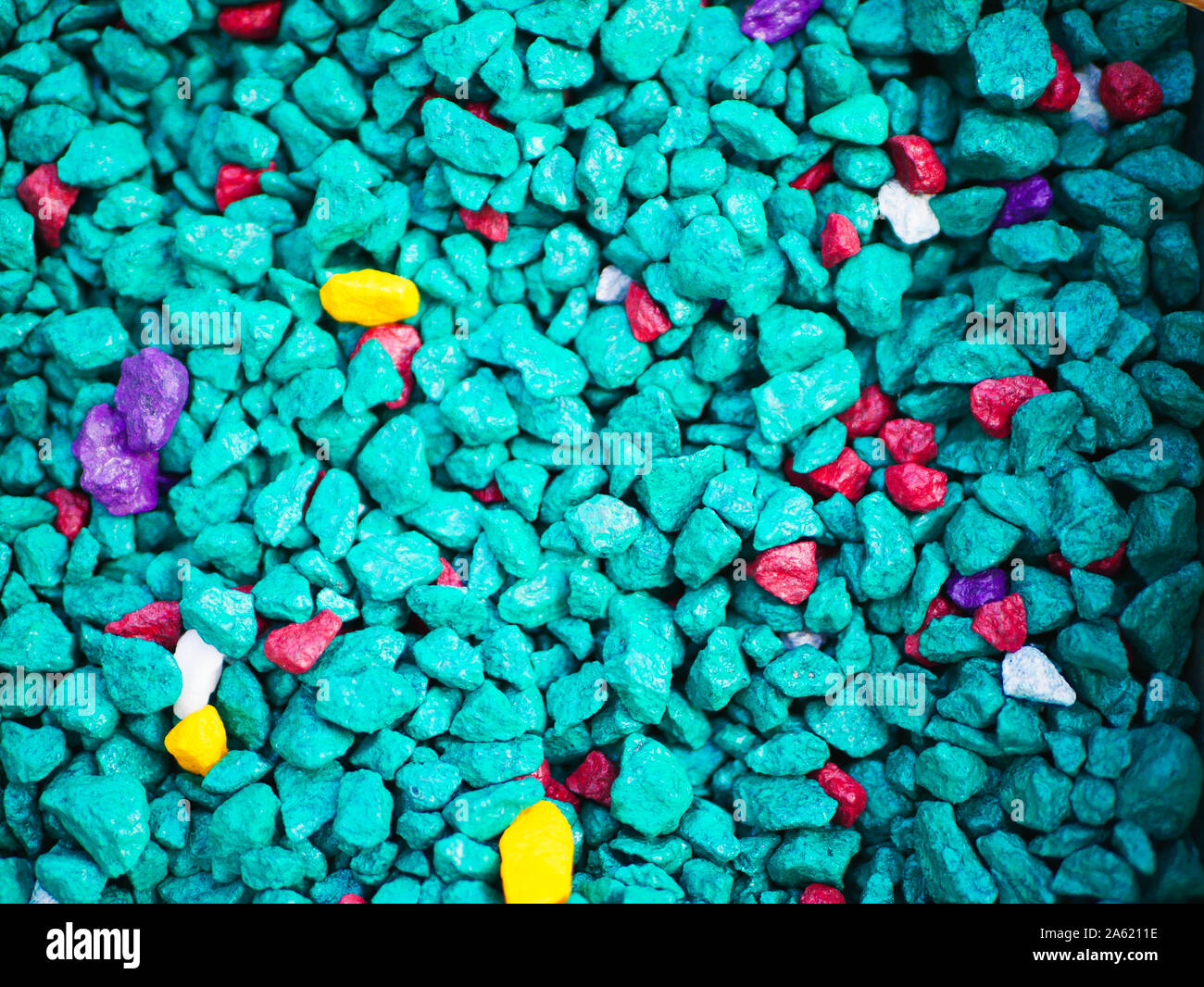 fine turquoise pebbles. The background consists of small turquoise ...