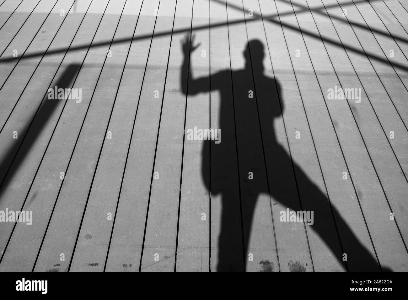 man shadow silhouette on the ground Stock Photo - Alamy
