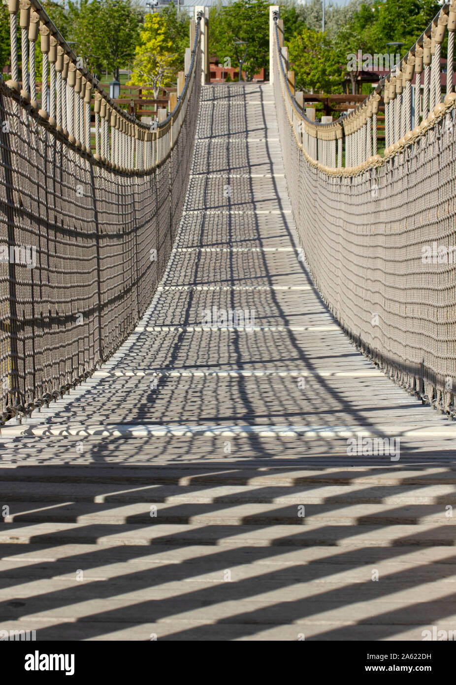 wooden suspension bridge in public park Stock Photo - Alamy
