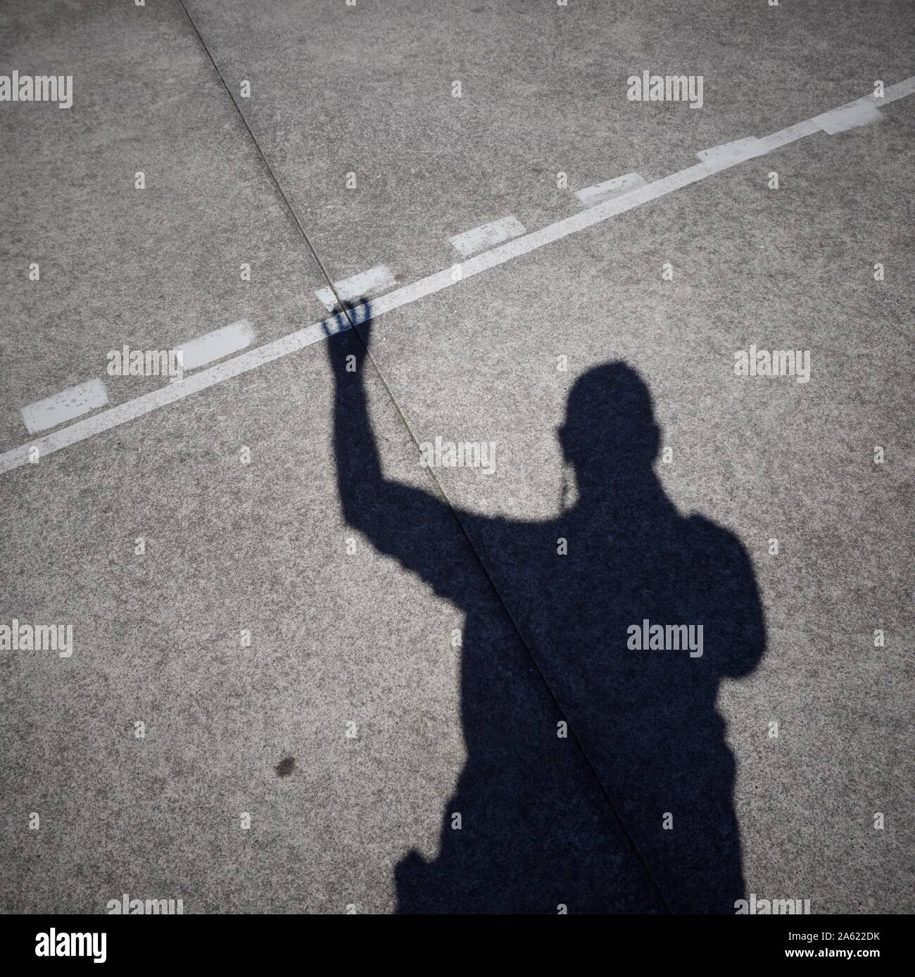 man shadow silhouette on the ground Stock Photo - Alamy