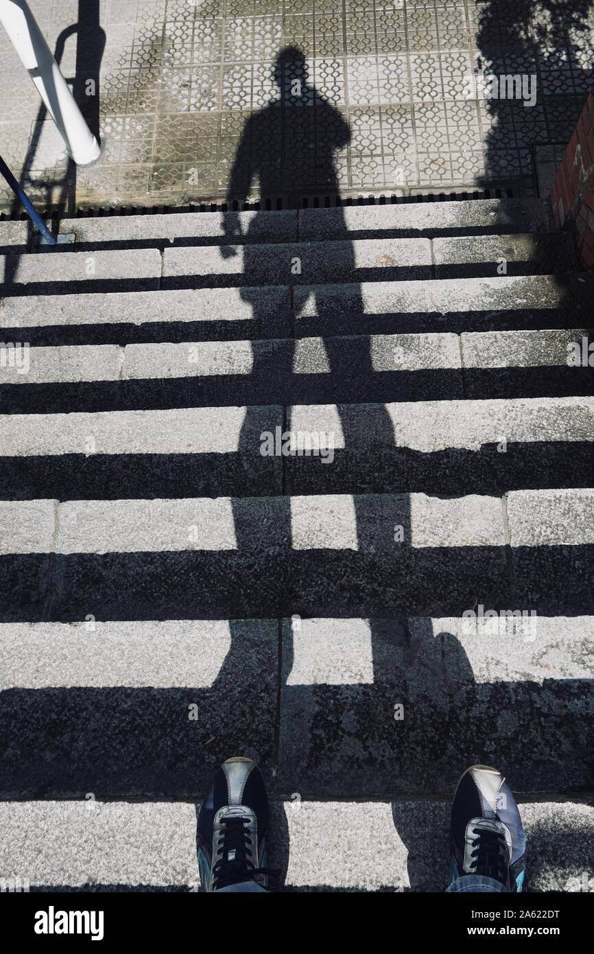 man shadow silhouette on the ground Stock Photo - Alamy