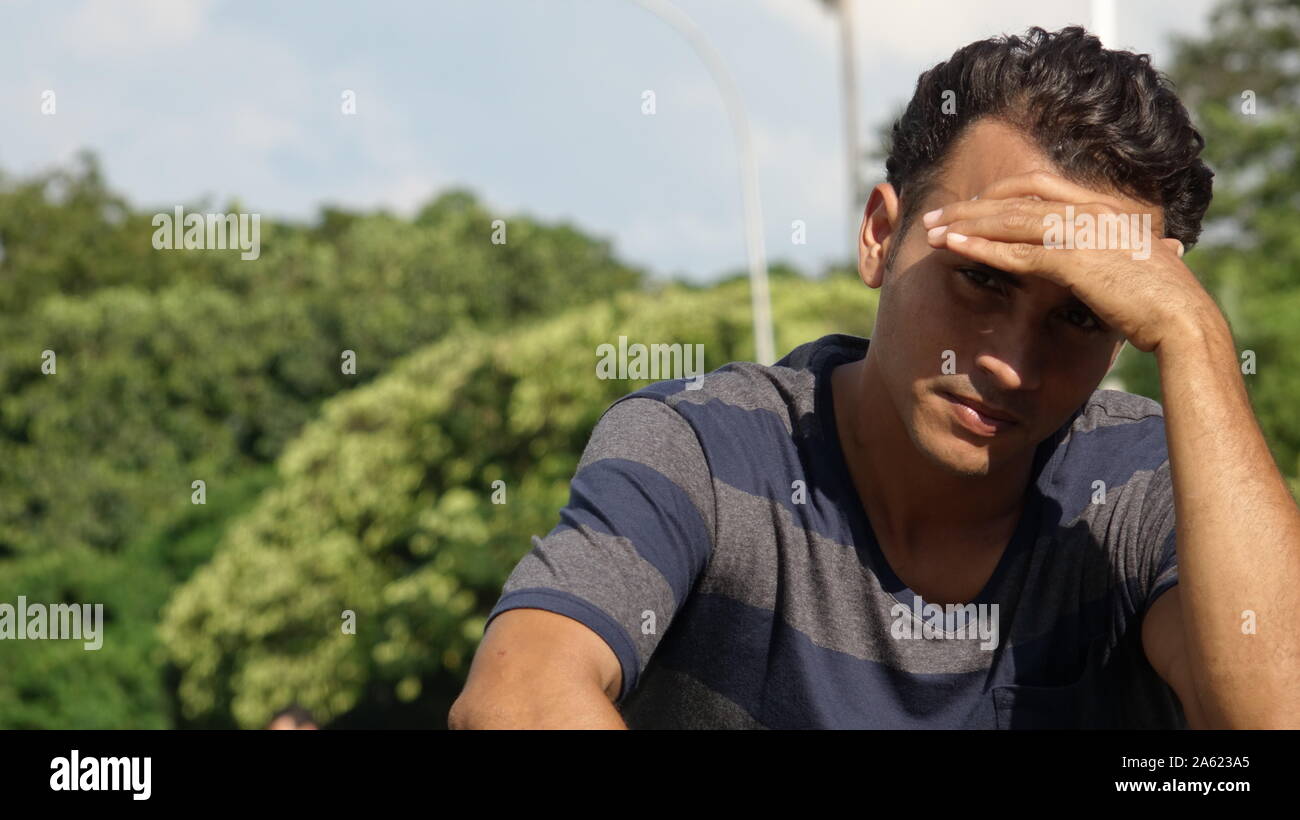 Minority Male And Sadness Stock Photo - Alamy