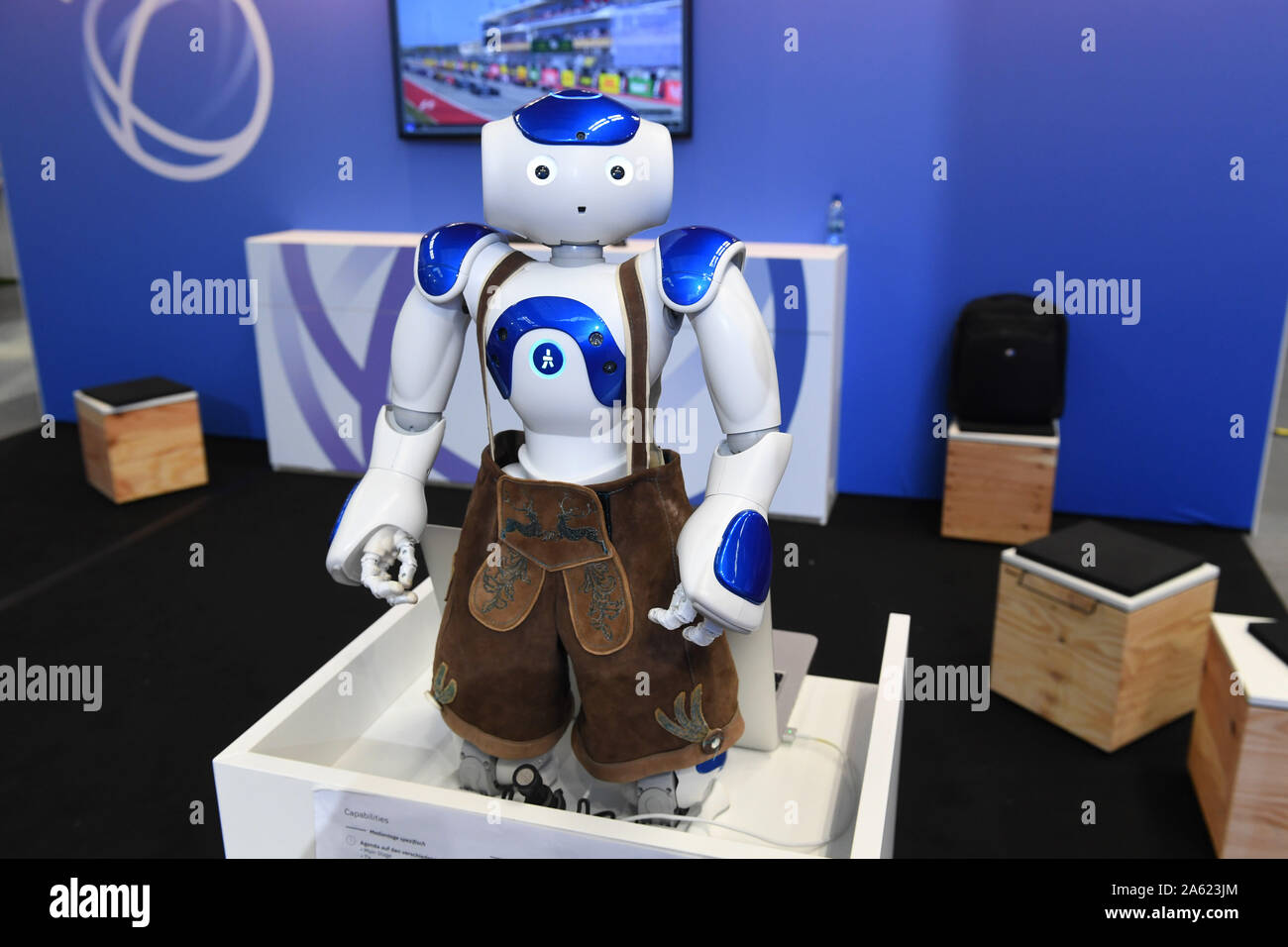 Munich, Germany. 23rd Oct, 2019. A robot figure in leather trousers ...