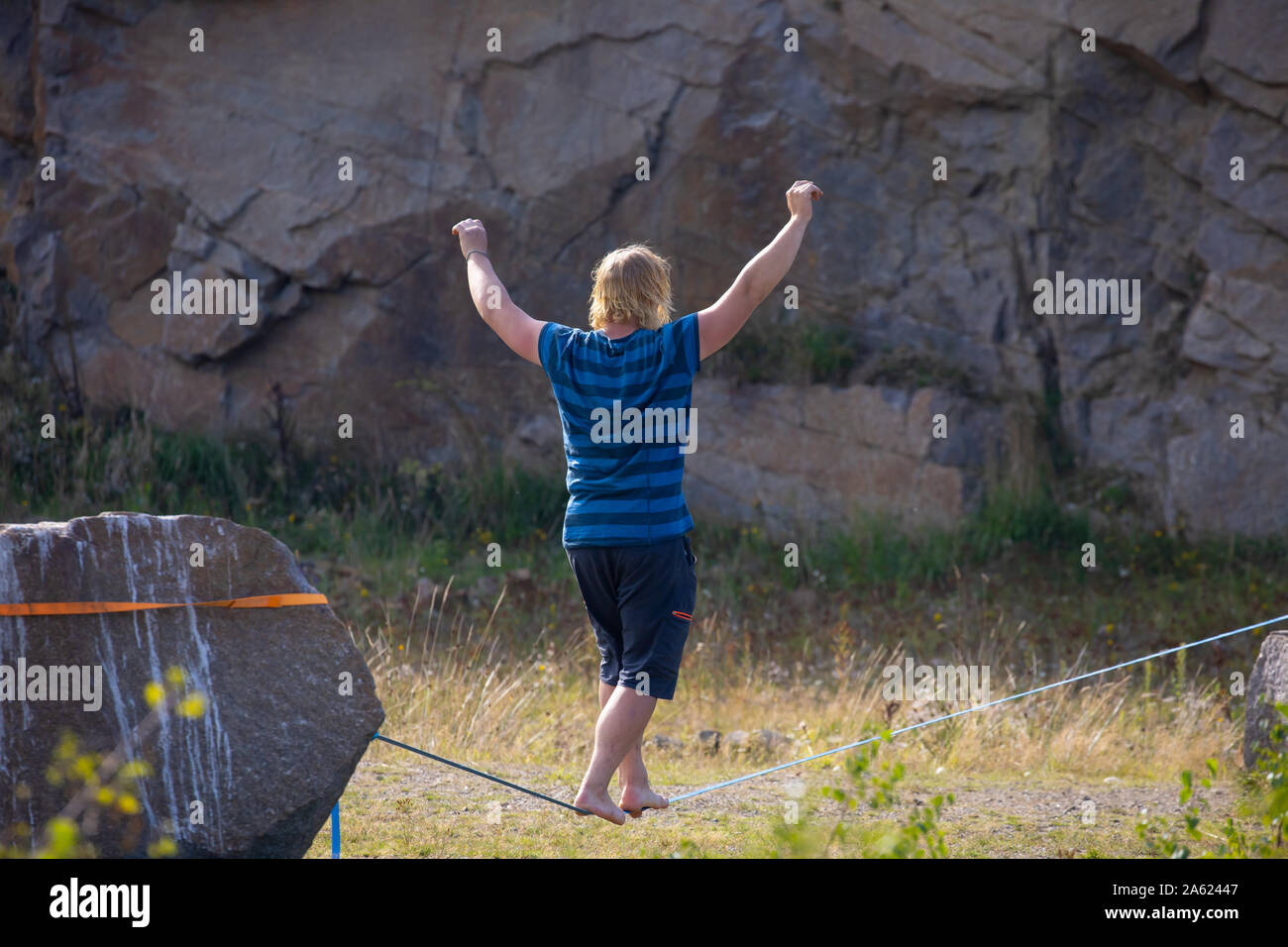 man on line, Bornholm island, man walking the acrobat Stock Photo - Alamy