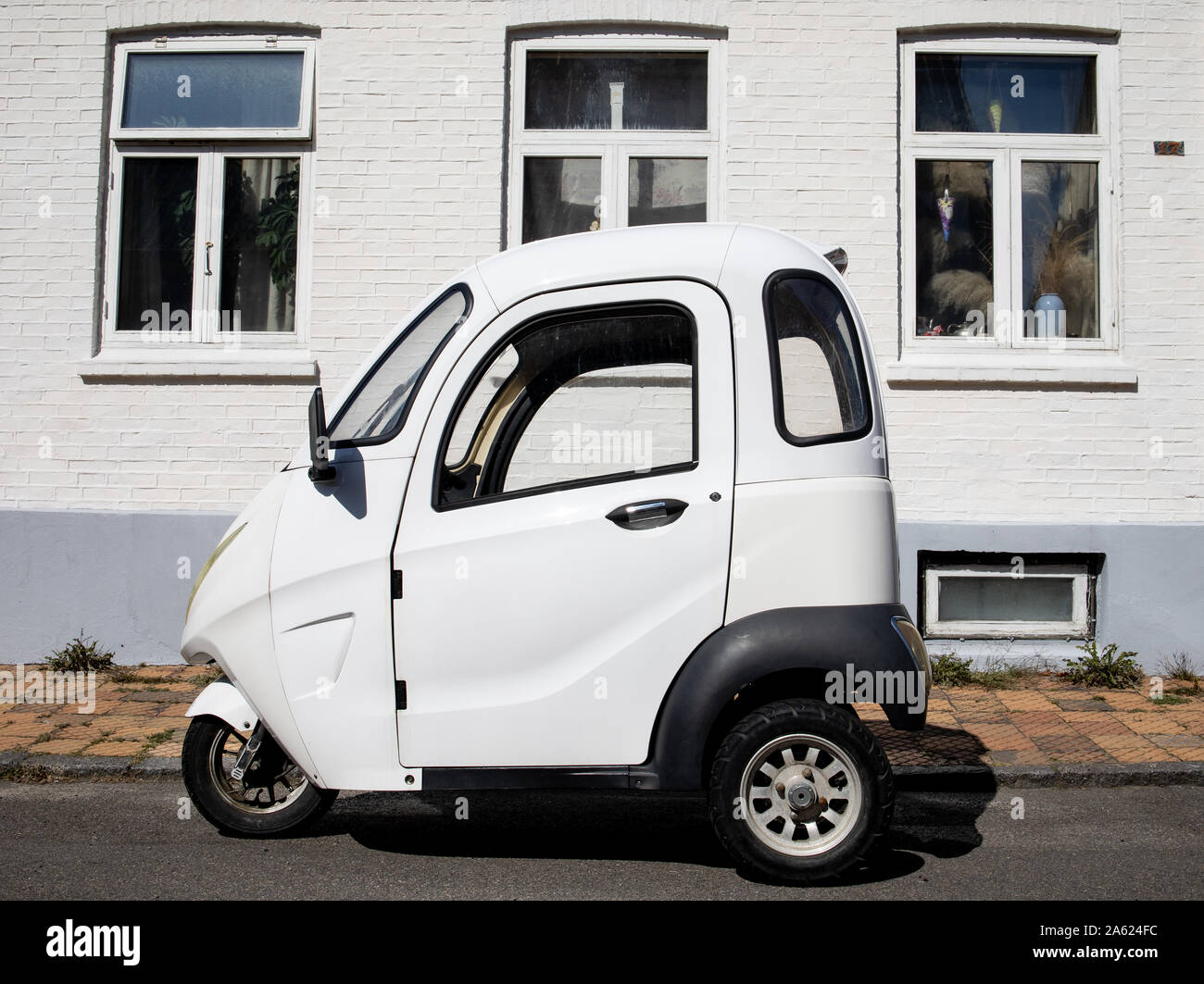 Little white car hi-res stock photography and images - Alamy