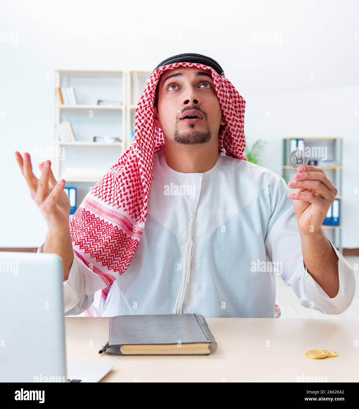 The arab man with bitcoin in cryptocurrency mining concept Stock Photo ...