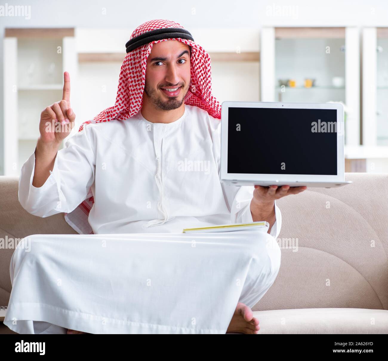 The arab man working at home on his work Stock Photo - Alamy