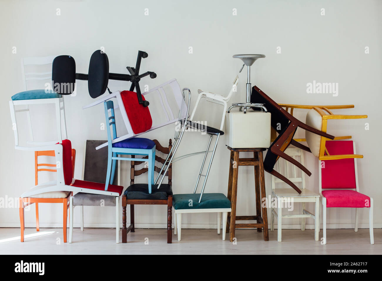 Abandoned chairs pile hi-res stock photography and images - Alamy