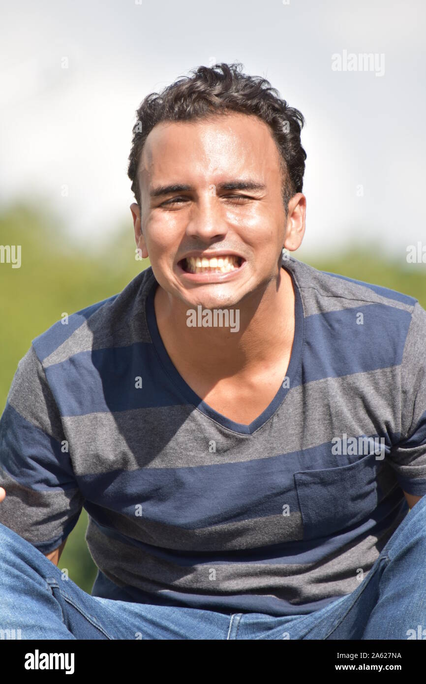 An Excited Hispanic Male Stock Photo - Alamy