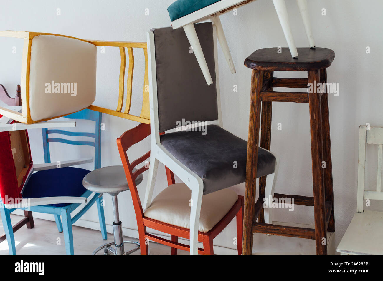 Multicolored old wooden chair hi-res stock photography and images - Alamy