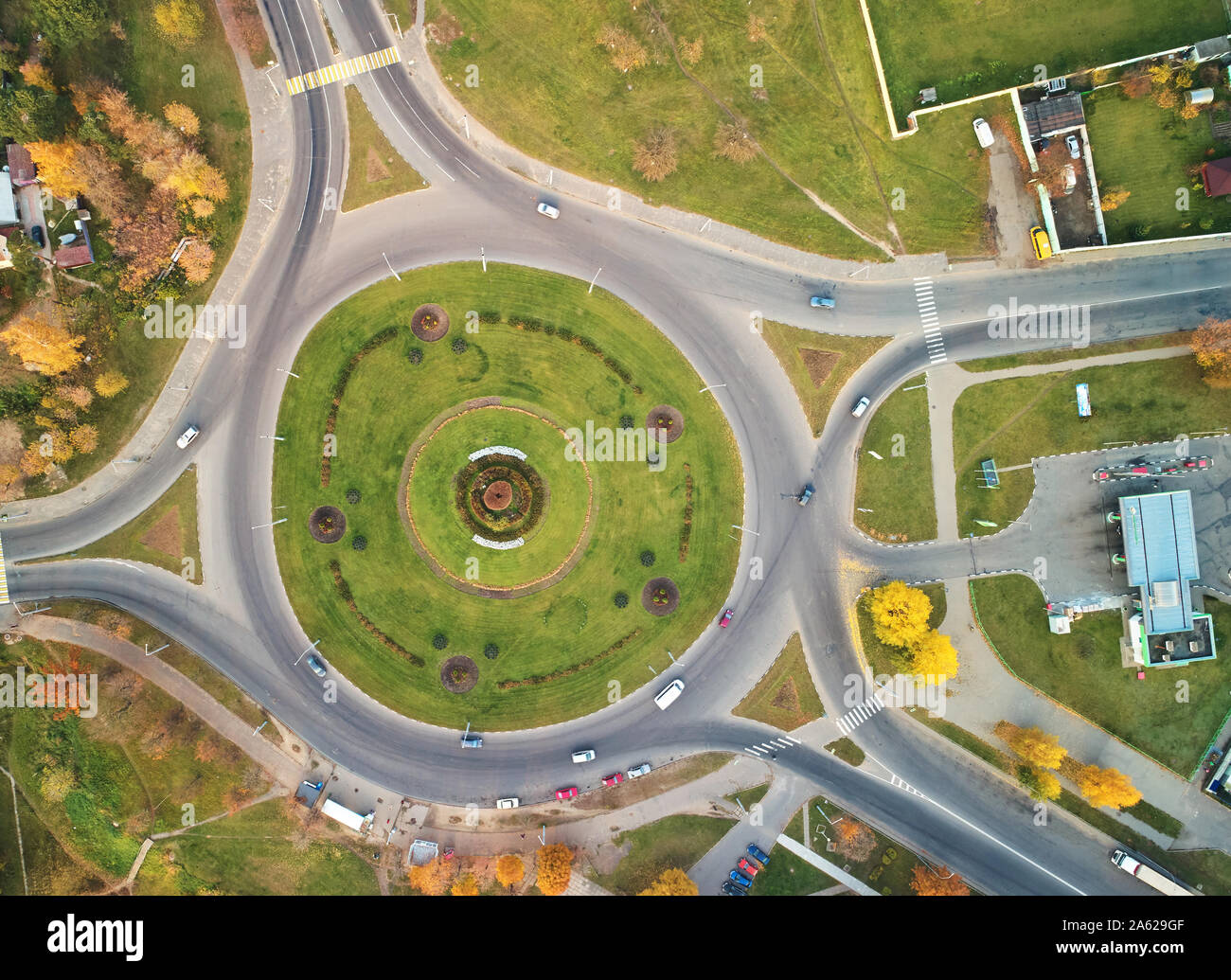 Transport roundabout above drone view with green grass background Stock ...