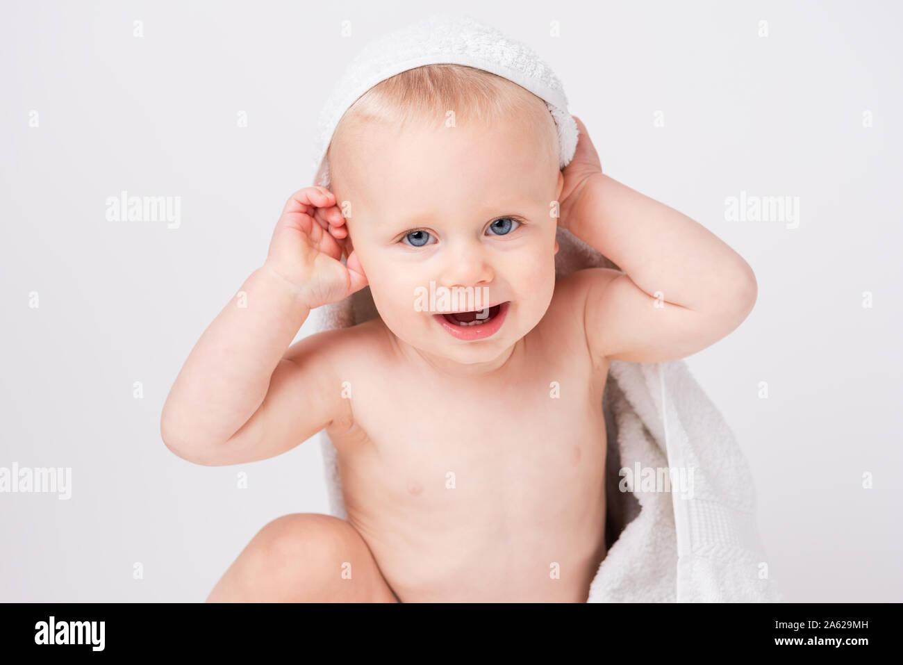 Boy with towel on his head hi-res stock photography and images - Alamy