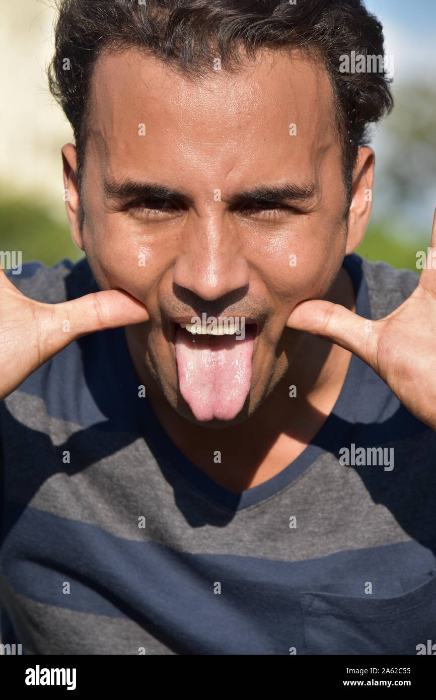 Colombian Male Making Funny Faces Stock Photo - Alamy