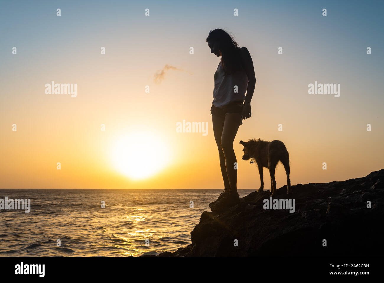 Woman sunrise magic girl sunrise hi-res stock photography and images ...