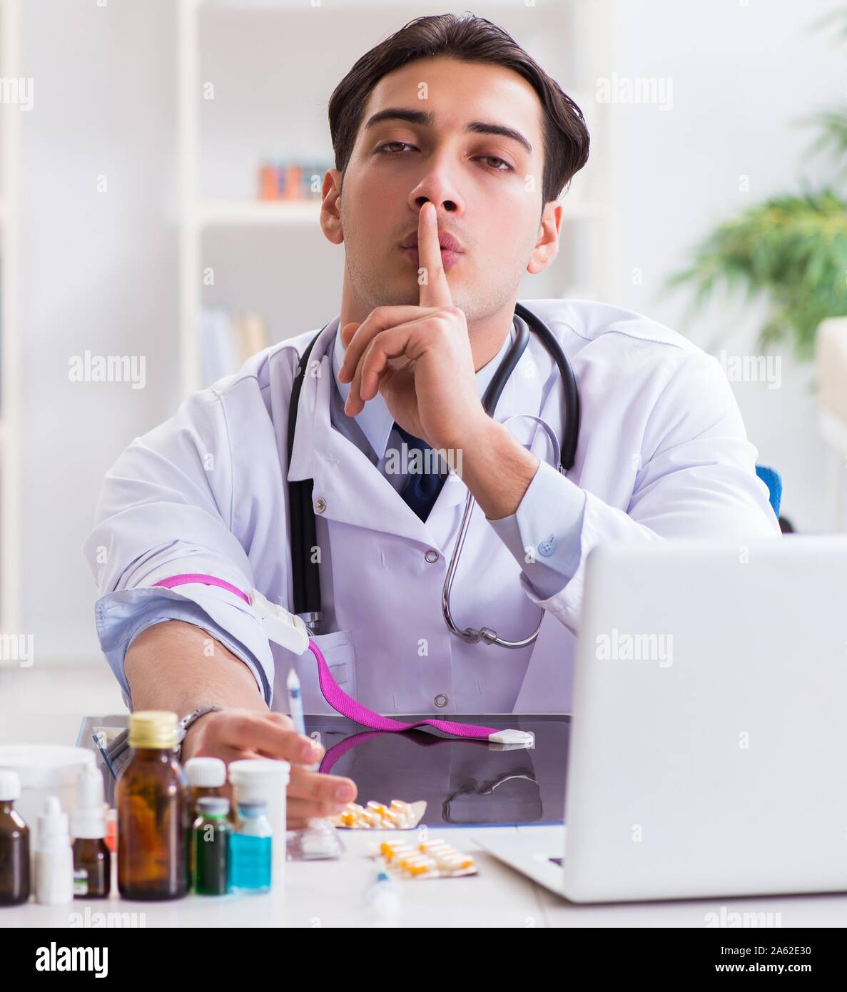 Doctor drug addict in the hospital Stock Photo - Alamy