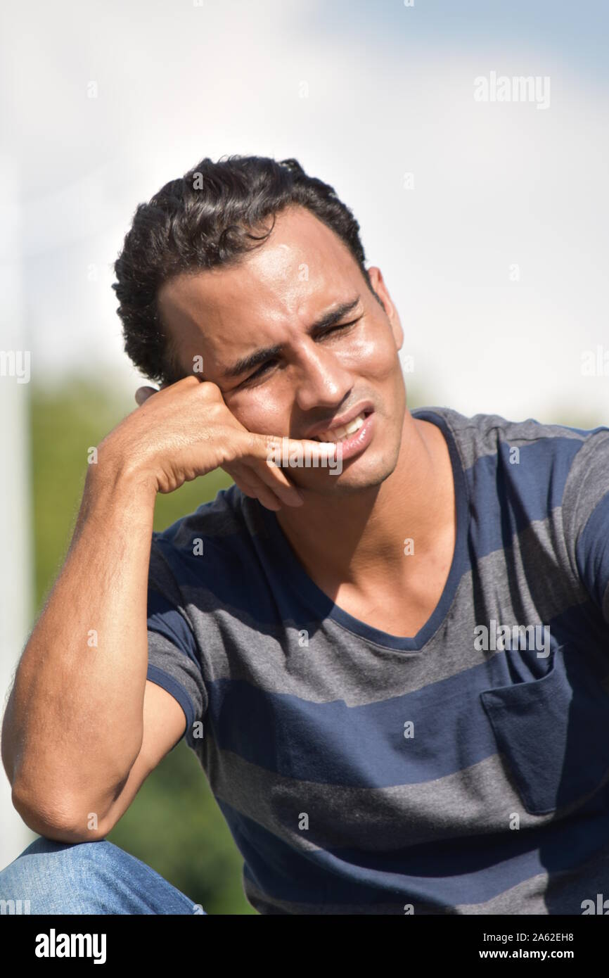 Colombian Male Talking On Phone Stock Photo - Alamy