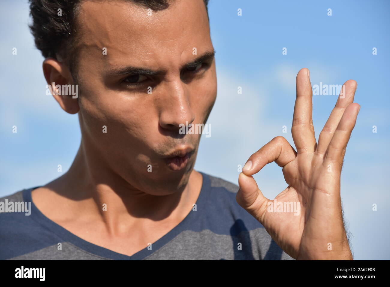 Male And Okay Sign Stock Photo - Alamy
