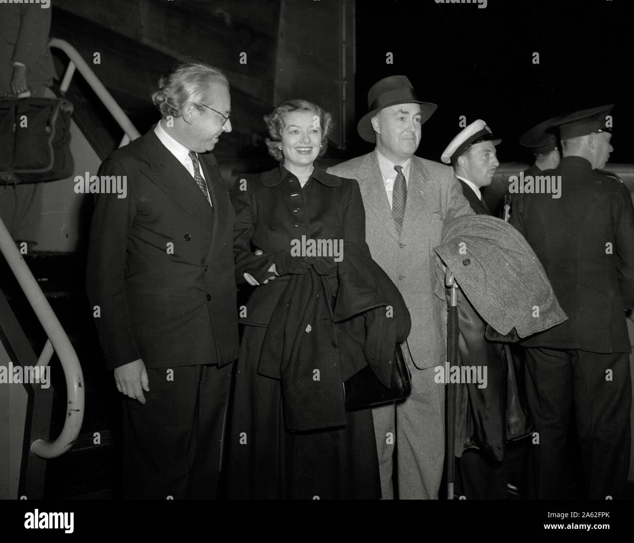 Myrna Loy and her husband, Gene Markey (right) circa 1948 File ...
