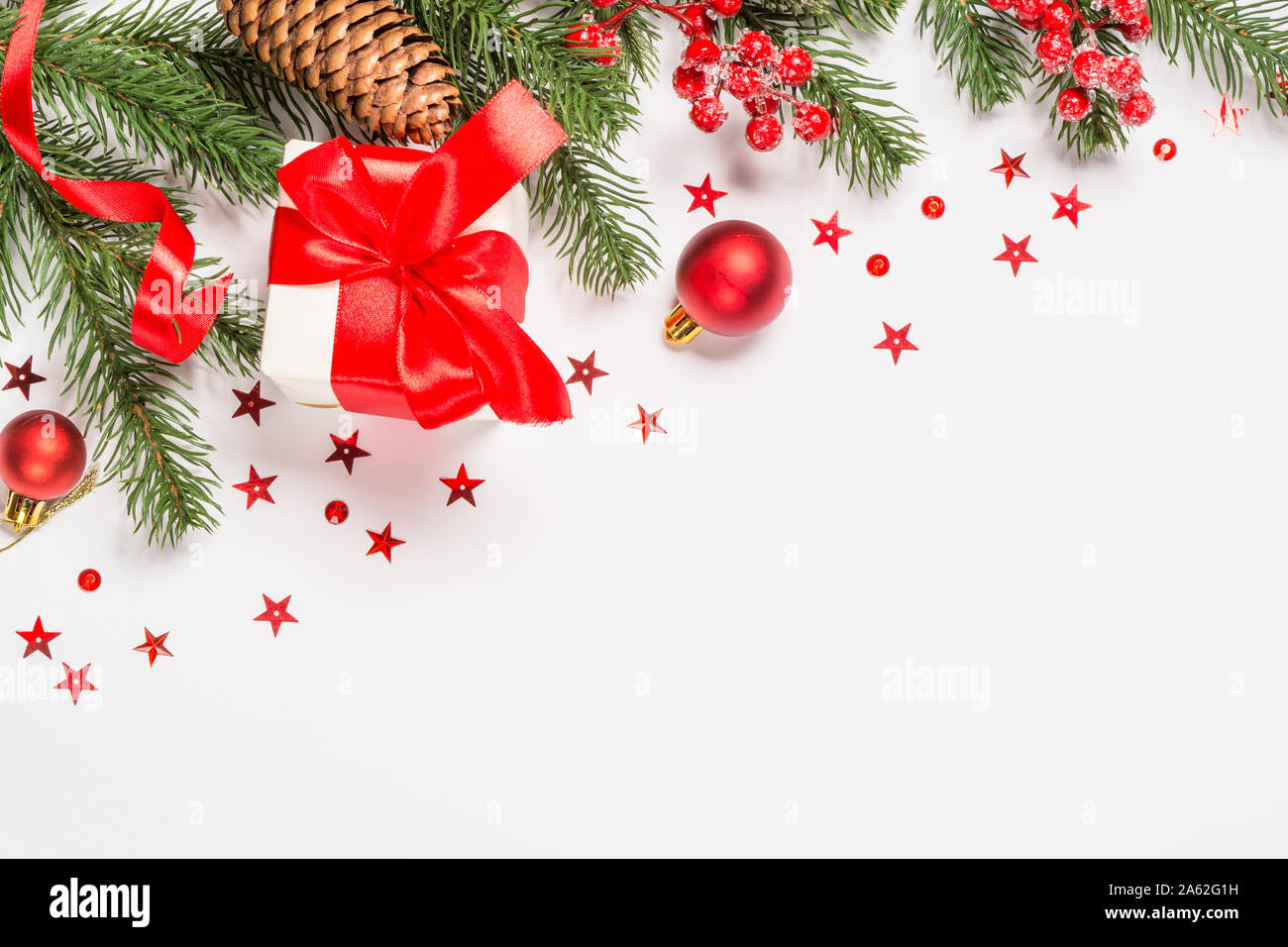 Christmas flat lay background with fir tree, present box and ...