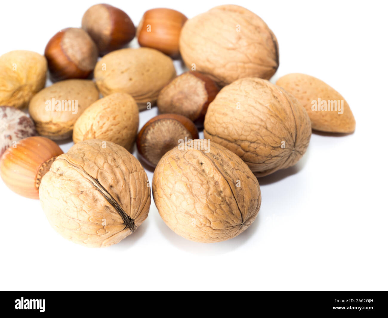 different nuts isolates on white background Stock Photo - Alamy