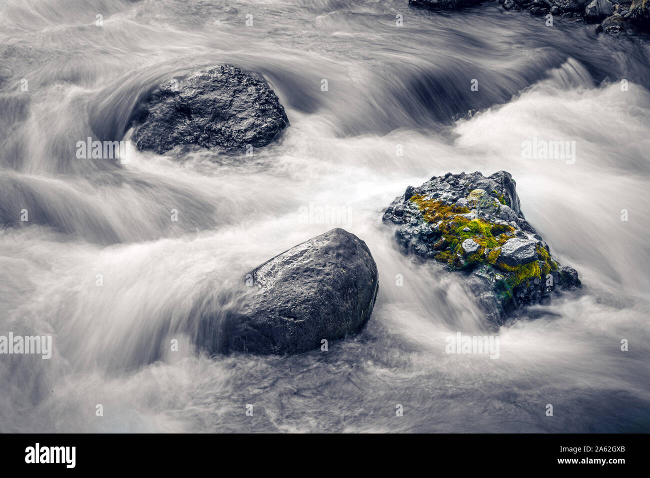 Water carving the rocks, long exposure Stock Photo - Alamy
