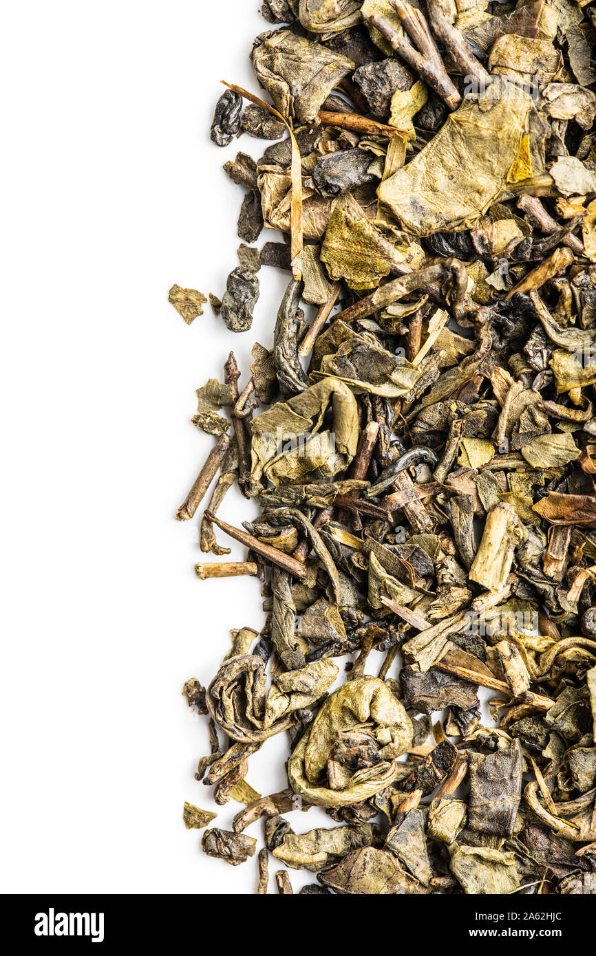 Dried green tea leaves isolated on white background Stock Photo - Alamy