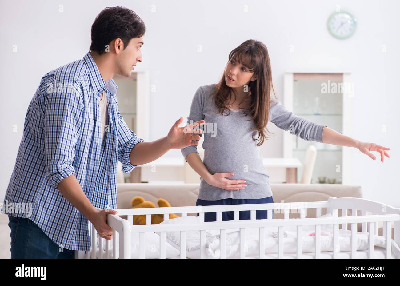 Young parents expecting their first baby Stock Photo - Alamy