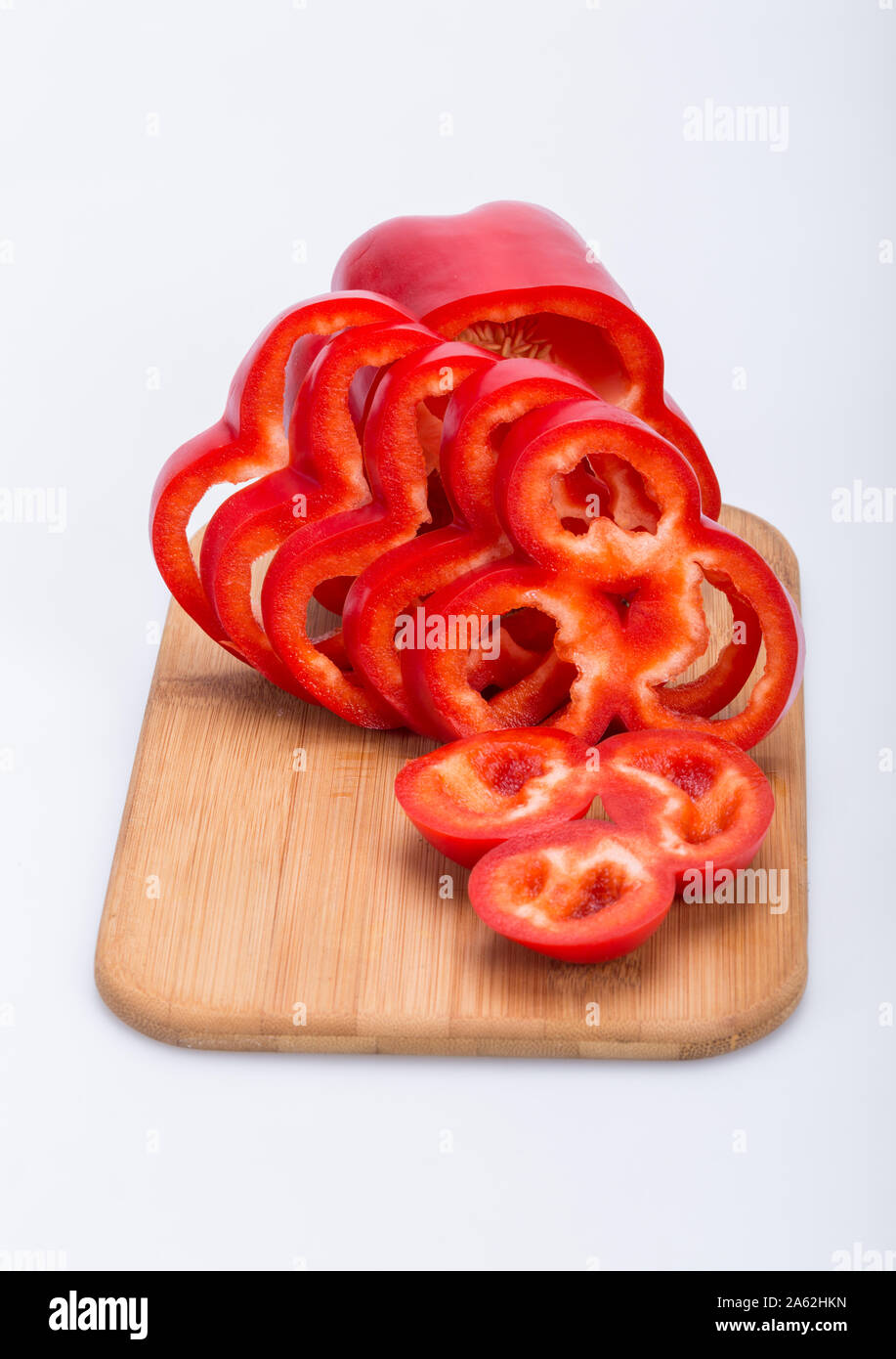 Sliced red pepper isolated on white background Stock Photo - Alamy