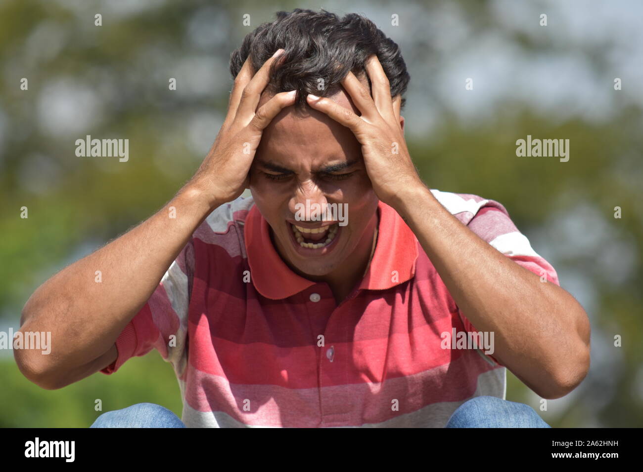 Stressed Hispanic Male Stock Photo - Alamy