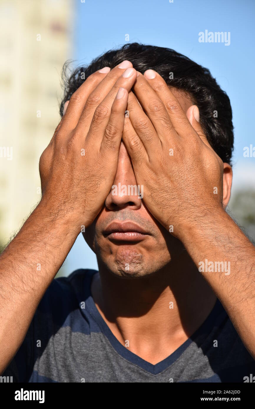 An Ashamed Minority Male Stock Photo - Alamy