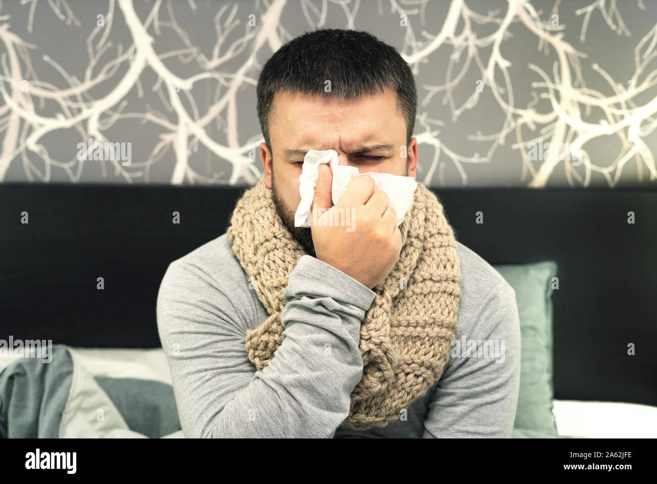 Disease. Cheer at home. A young man is sick, is treated at home. Blows ...